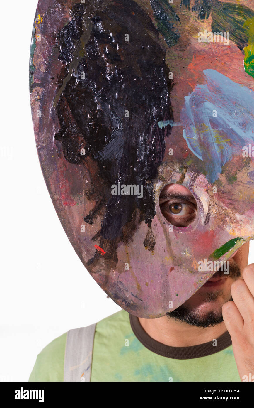 Portrait of an eccentric artist holding his palette Stock Photo - Alamy