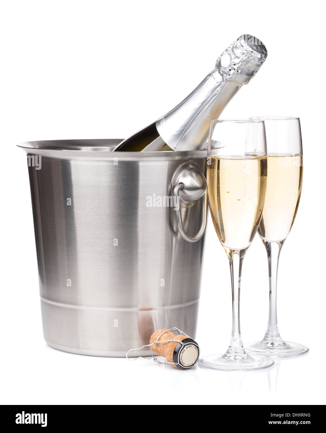 Champagne bottle in bucket and two glasses. Isolated on white ...