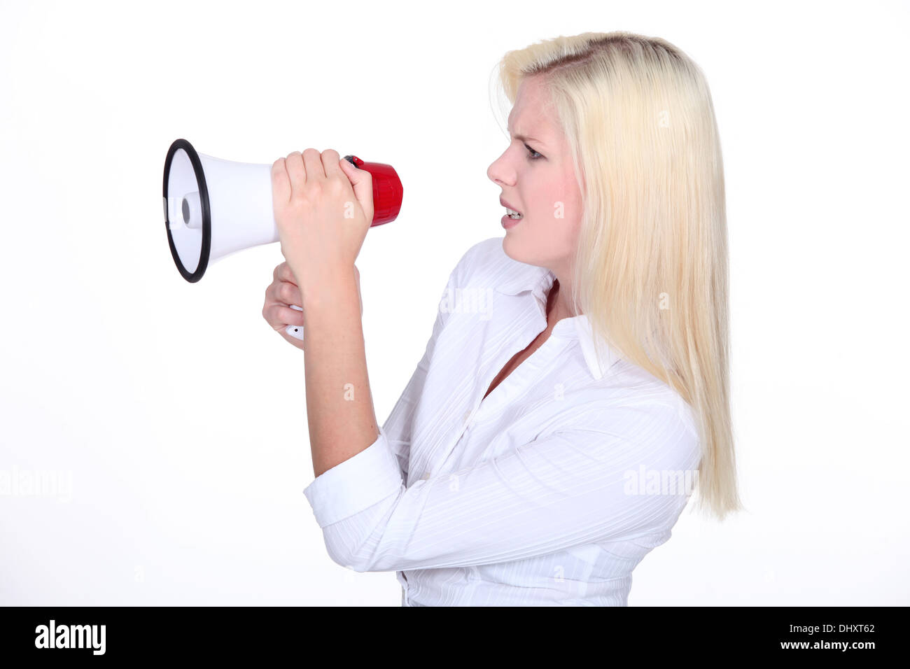 Young woman with bullhorn Stock Photo - Alamy