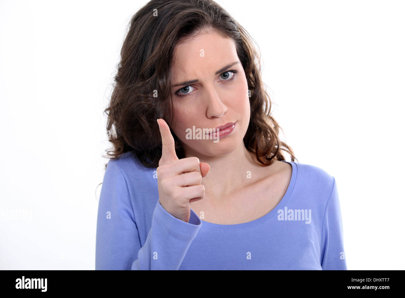 Strict woman waving finger Stock Photo - Alamy