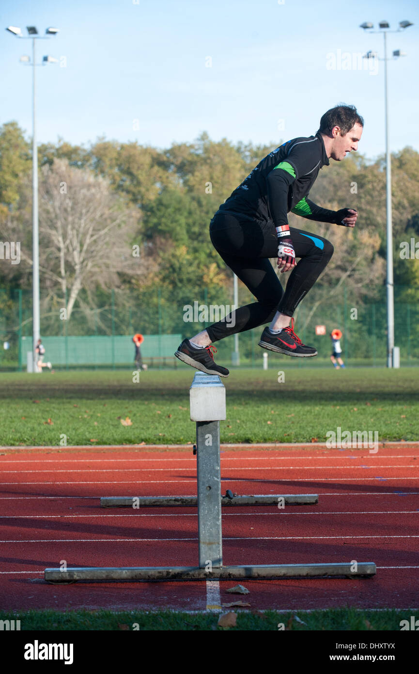Battersea Park, London, UK. 16th November 2013. Runners race around the ...
