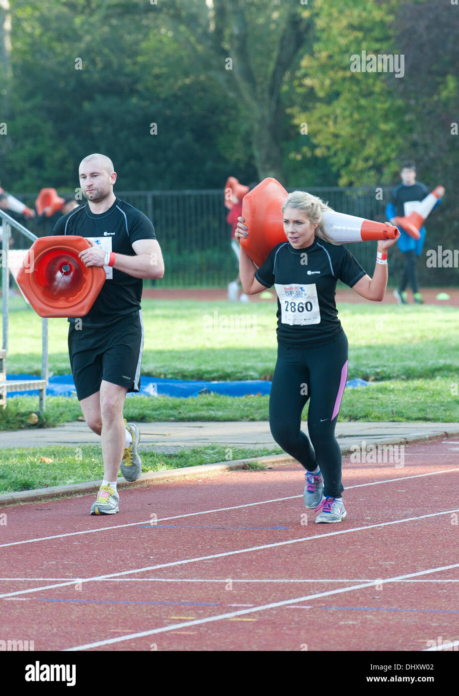 Battersea Park, London, UK. 16th November 2013. Runners race around the ...