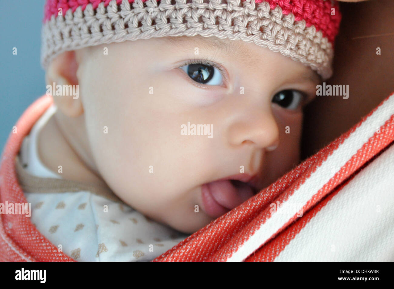 young baby wearing knitted hat Stock Photo - Alamy