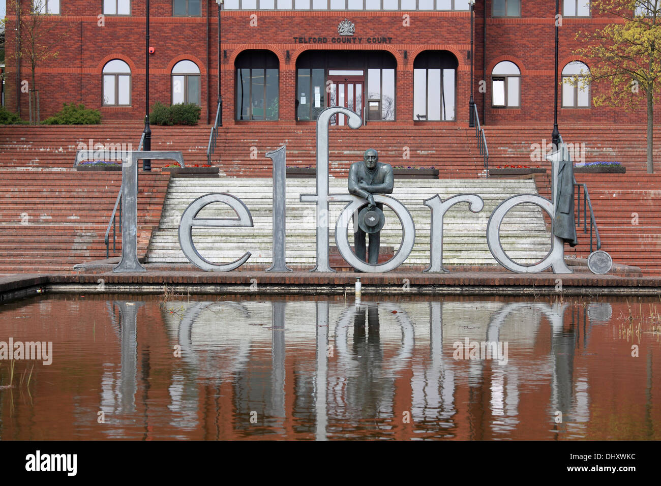 A statue of the great engineer Thomas Telford leaning on the letters of ...