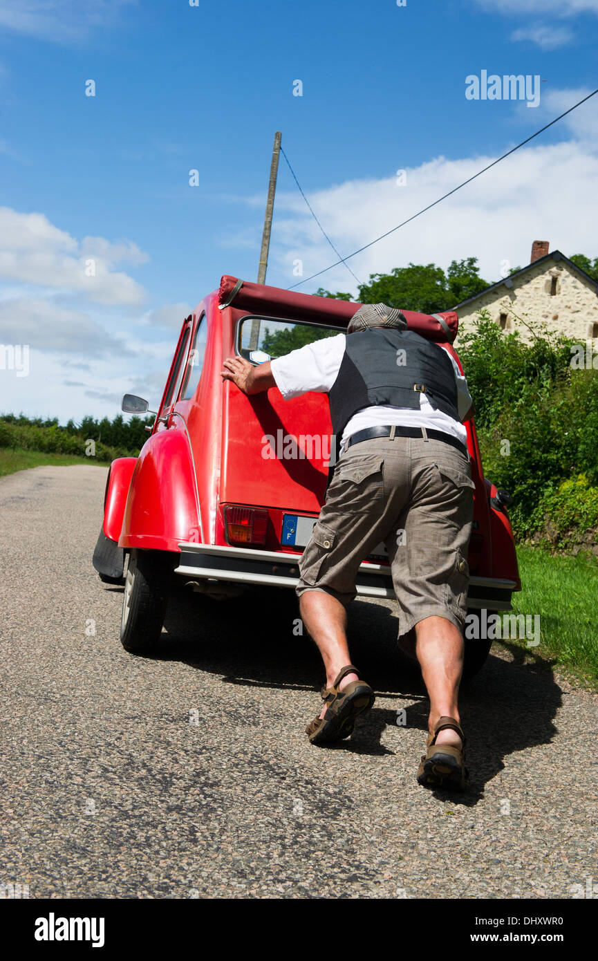 Funny pushing car hi-res stock photography and images - Alamy
