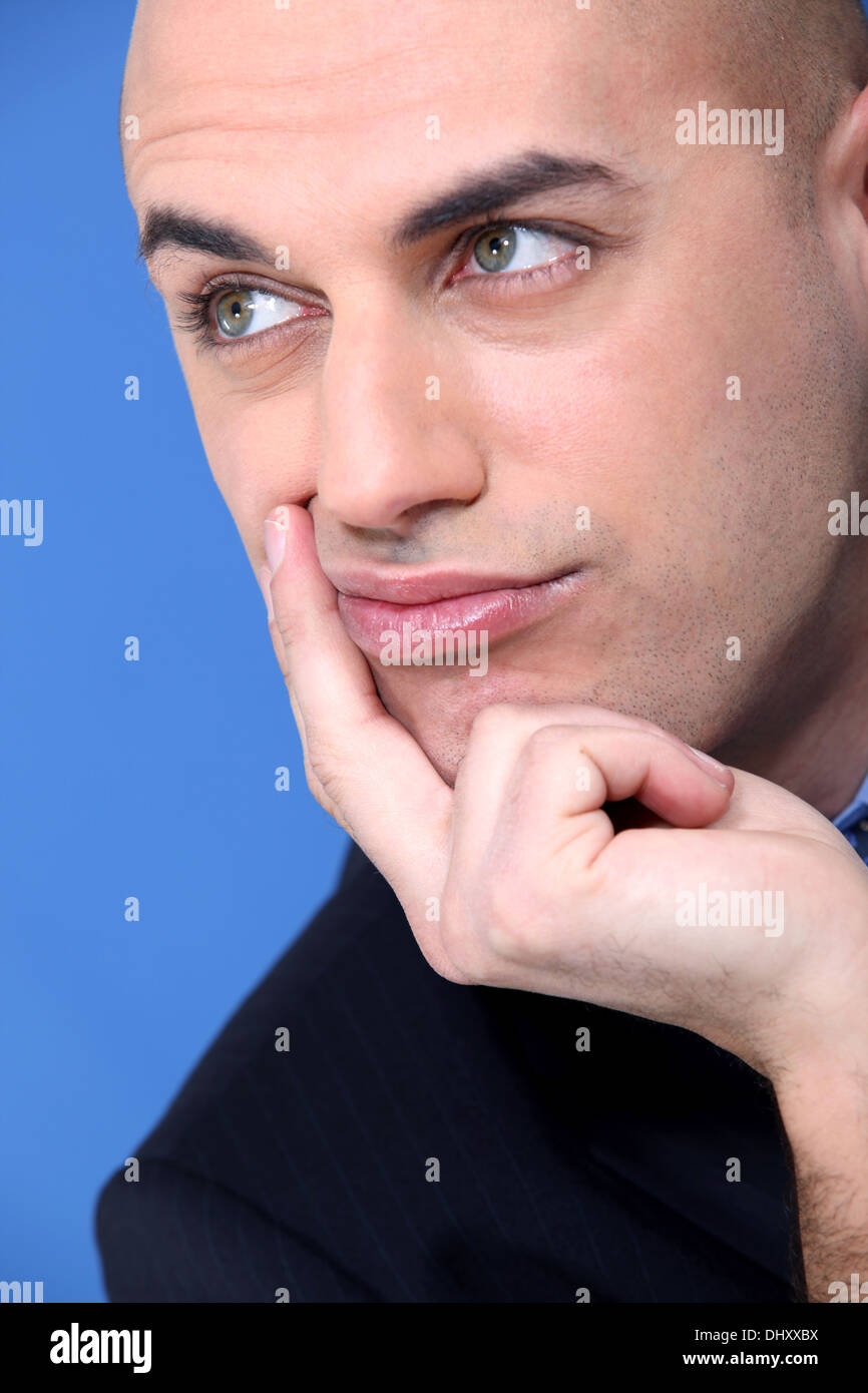 A pensive man Stock Photo - Alamy