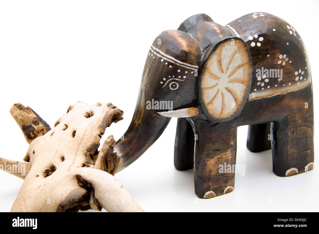 Elephant with wooden root Stock Photo - Alamy