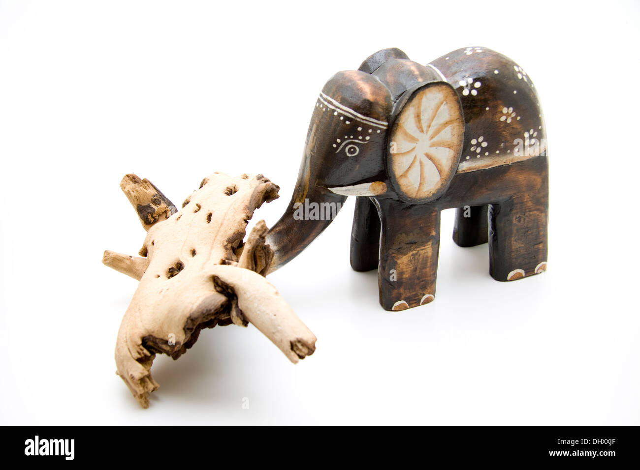 Elephant with wooden root Stock Photo - Alamy