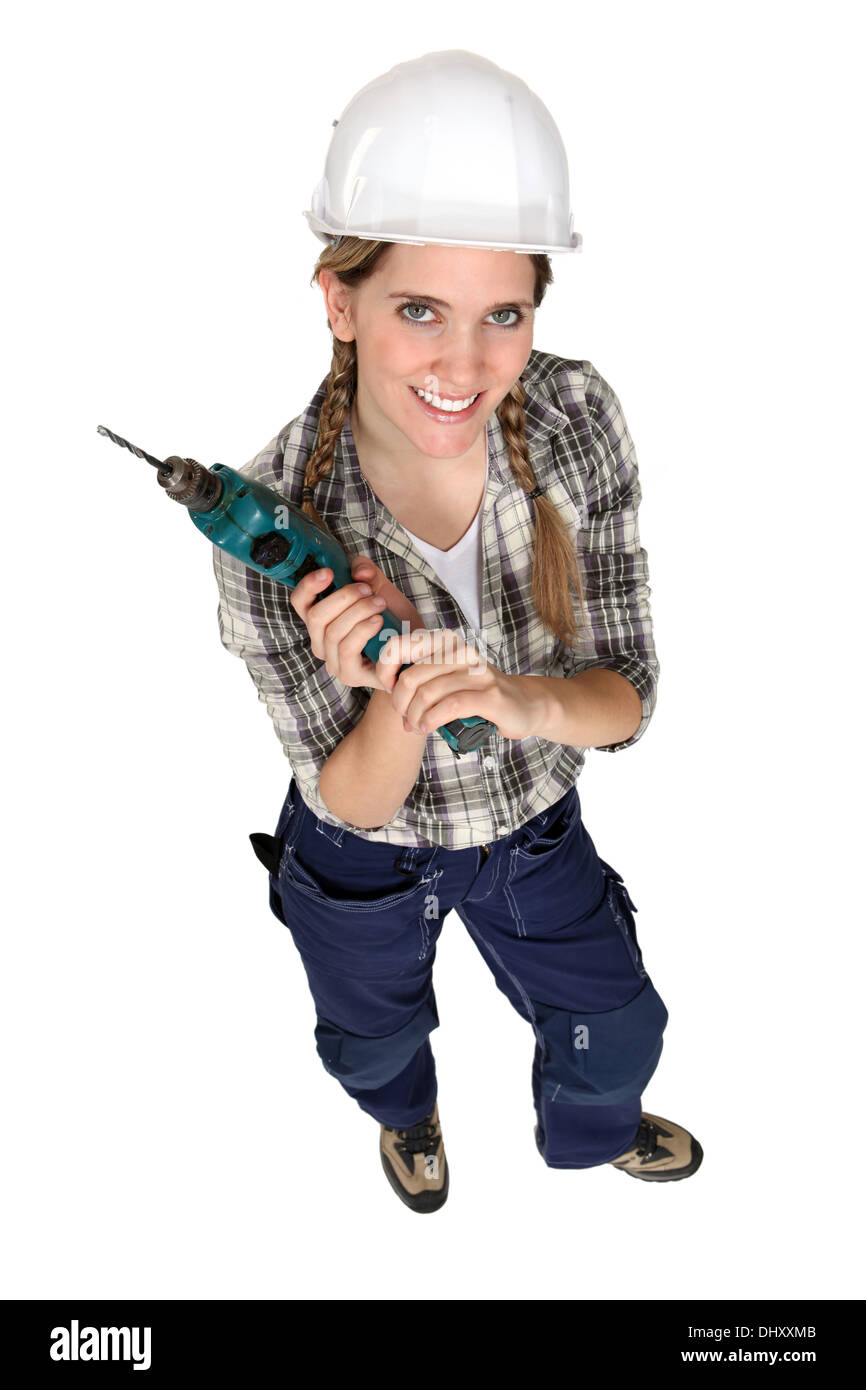 Female builder with a drill Stock Photo - Alamy