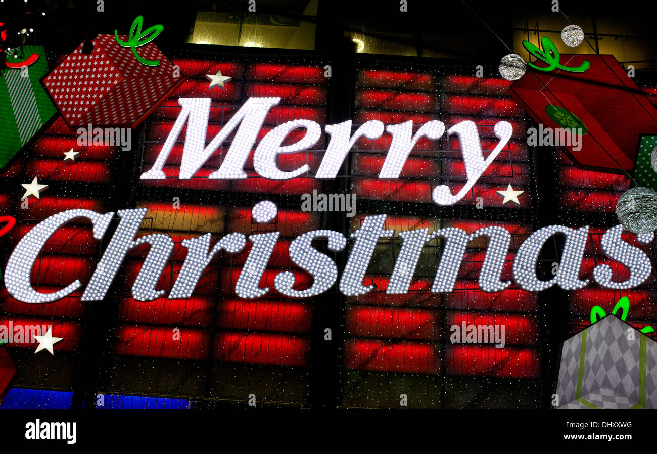 Merry Christmas sign on store in Oxford Street, London Stock Photo - Alamy