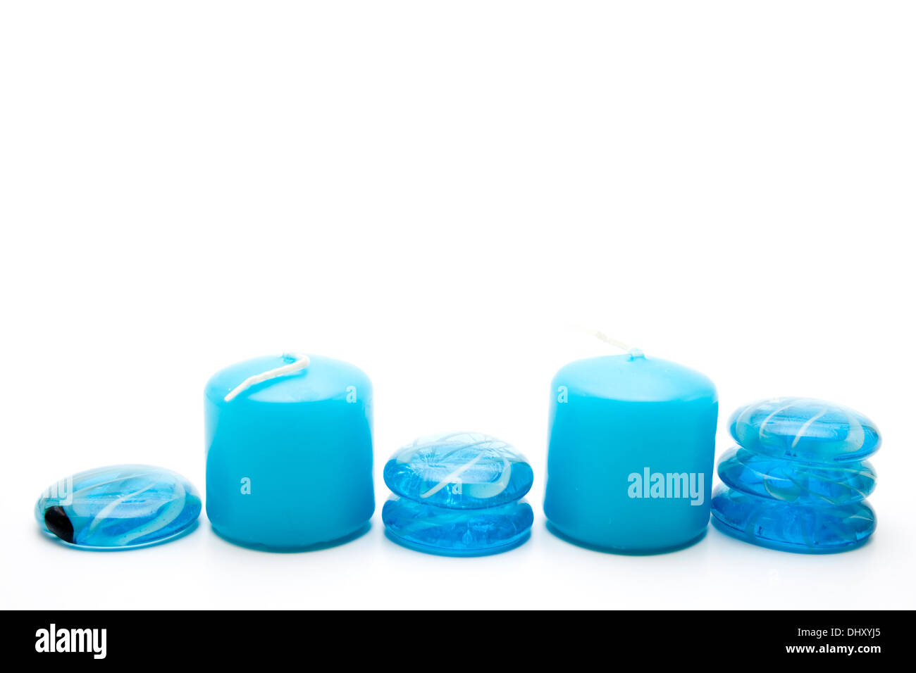 Blue candles with glass stones Stock Photo - Alamy