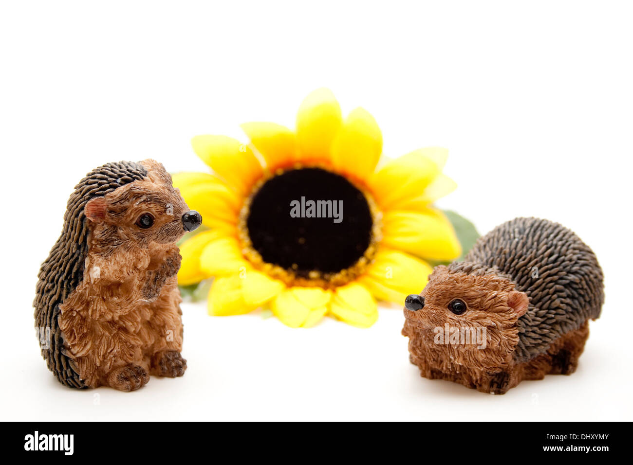 Hedgehog figure with sunflower Stock Photo - Alamy