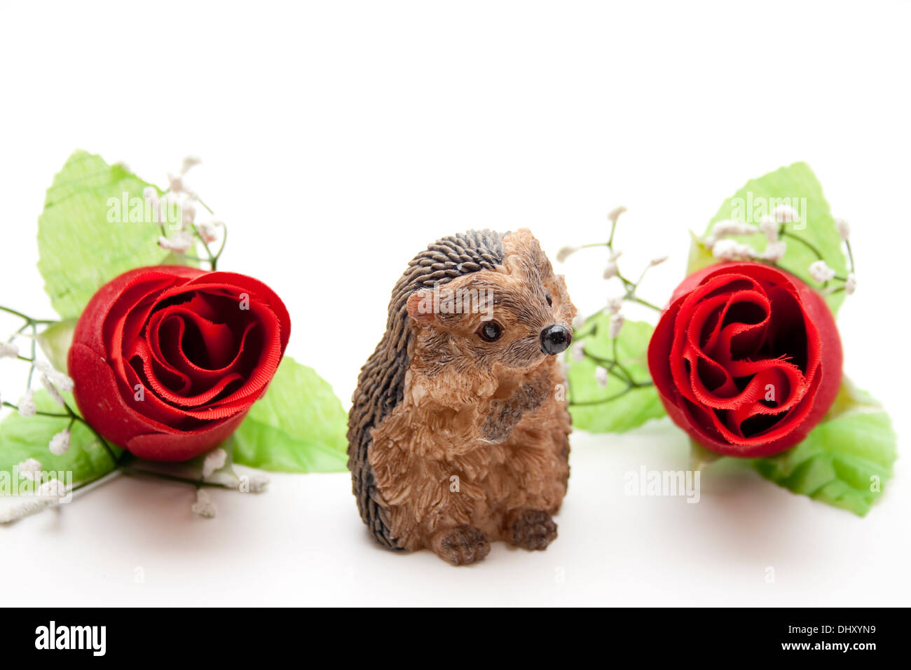 Hedgehog figure with roses Stock Photo - Alamy