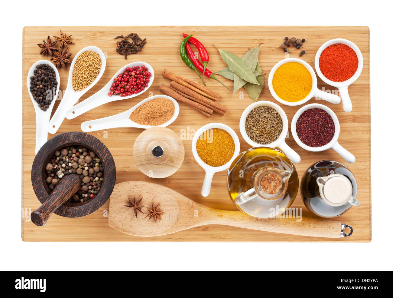 Various spices selection on cutting board. Isolated on white background ...