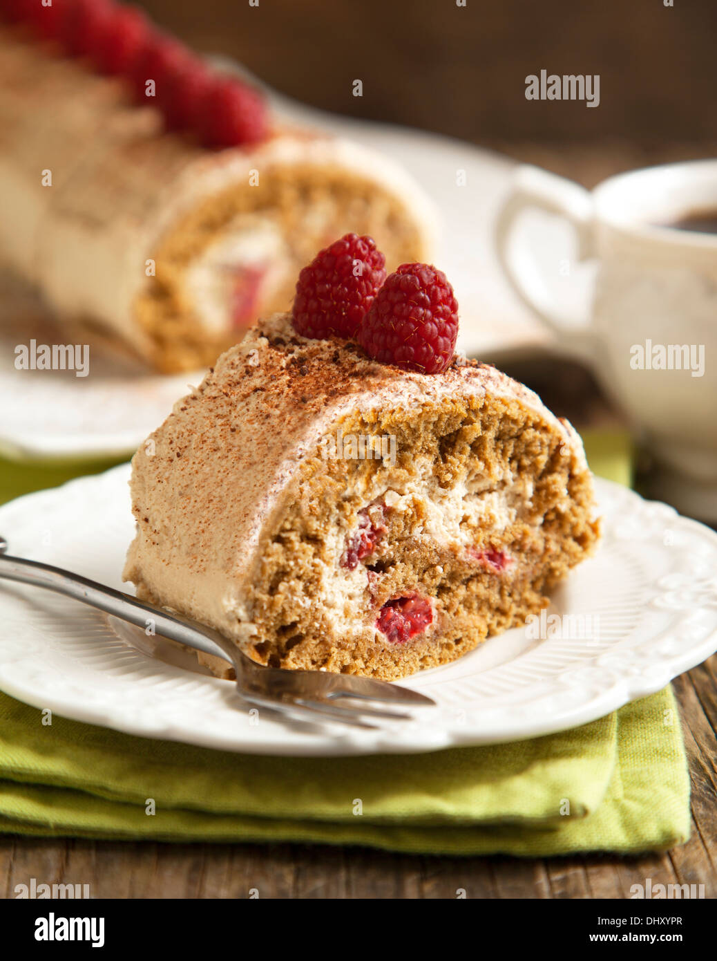 Coffee roll with raspberry Stock Photo - Alamy