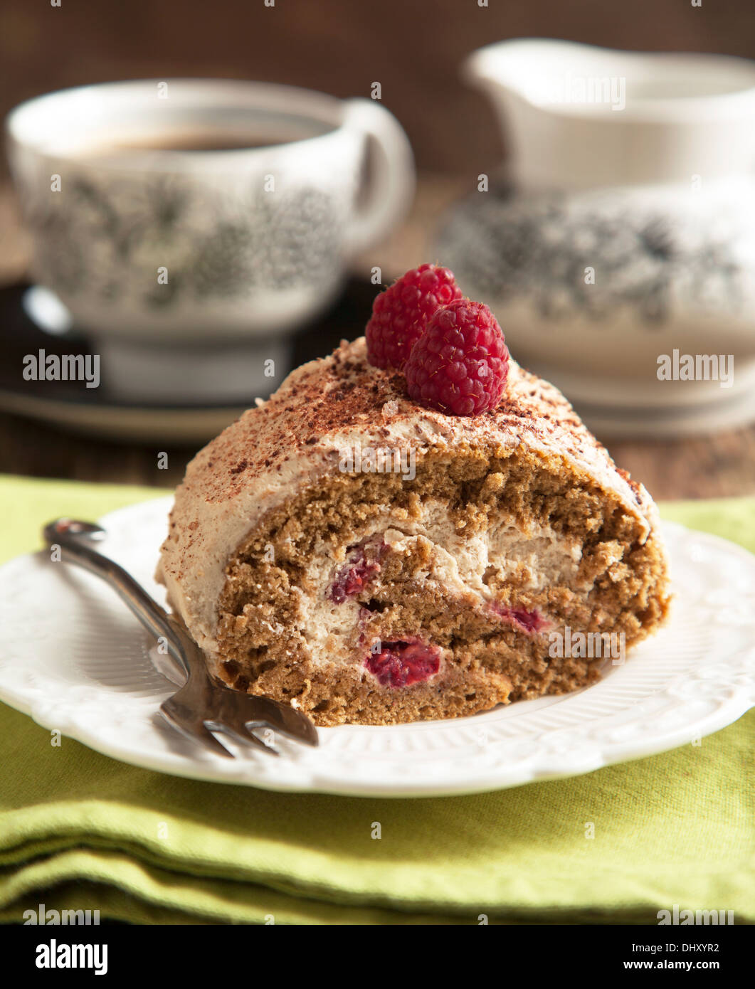 Coffee roll with raspberry Stock Photo - Alamy