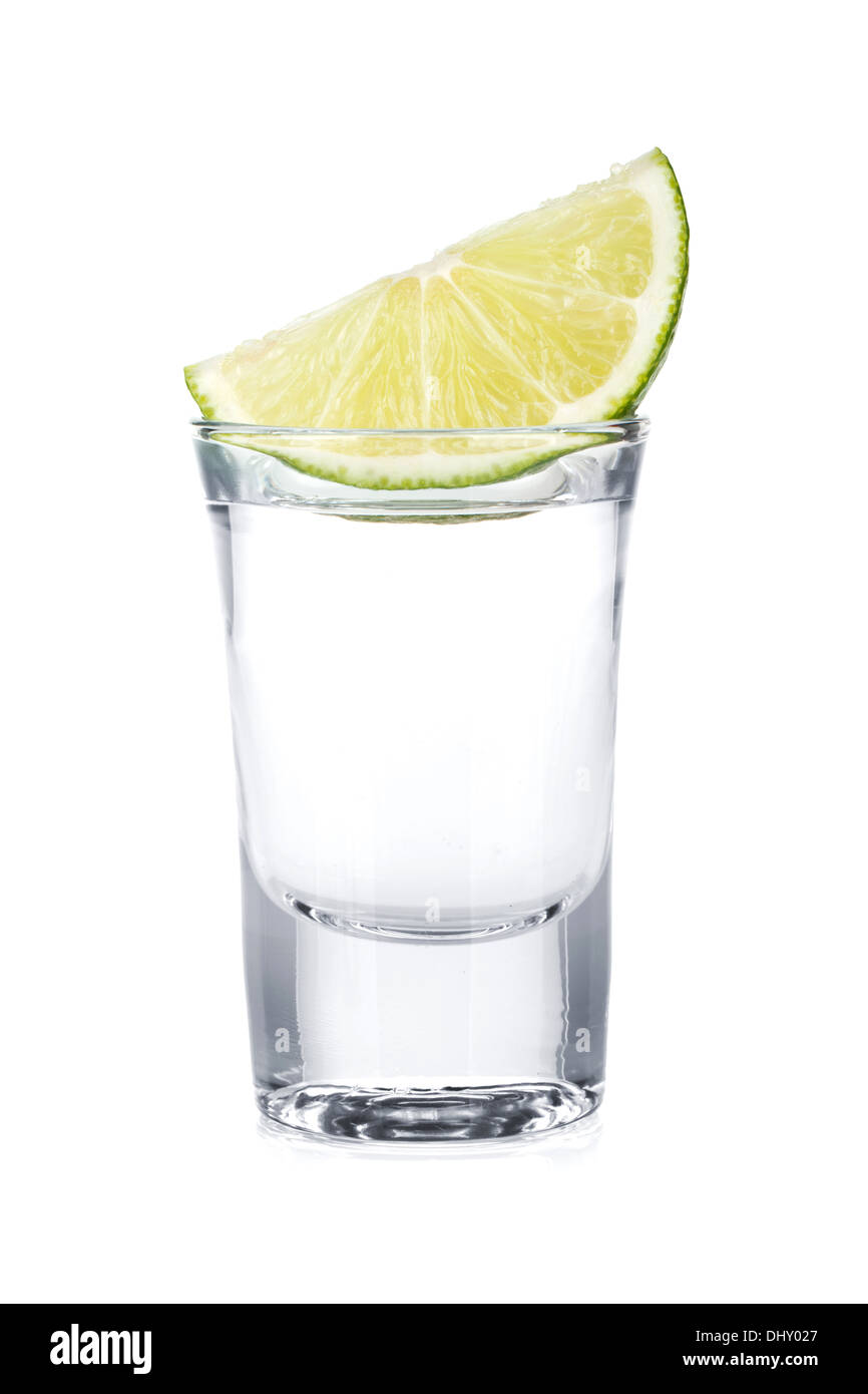 Shot of vodka and lime slice. Isolated on white background Stock Photo ...