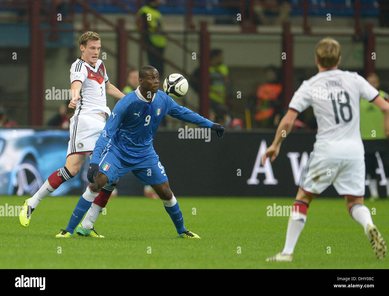Milan, Italy. 15th Nov, 2013. Germany's Marcell Jansen (L-R) and Italy ...