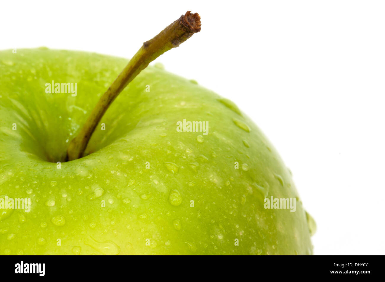 Green Apple wet on white background Stock Photo - Alamy