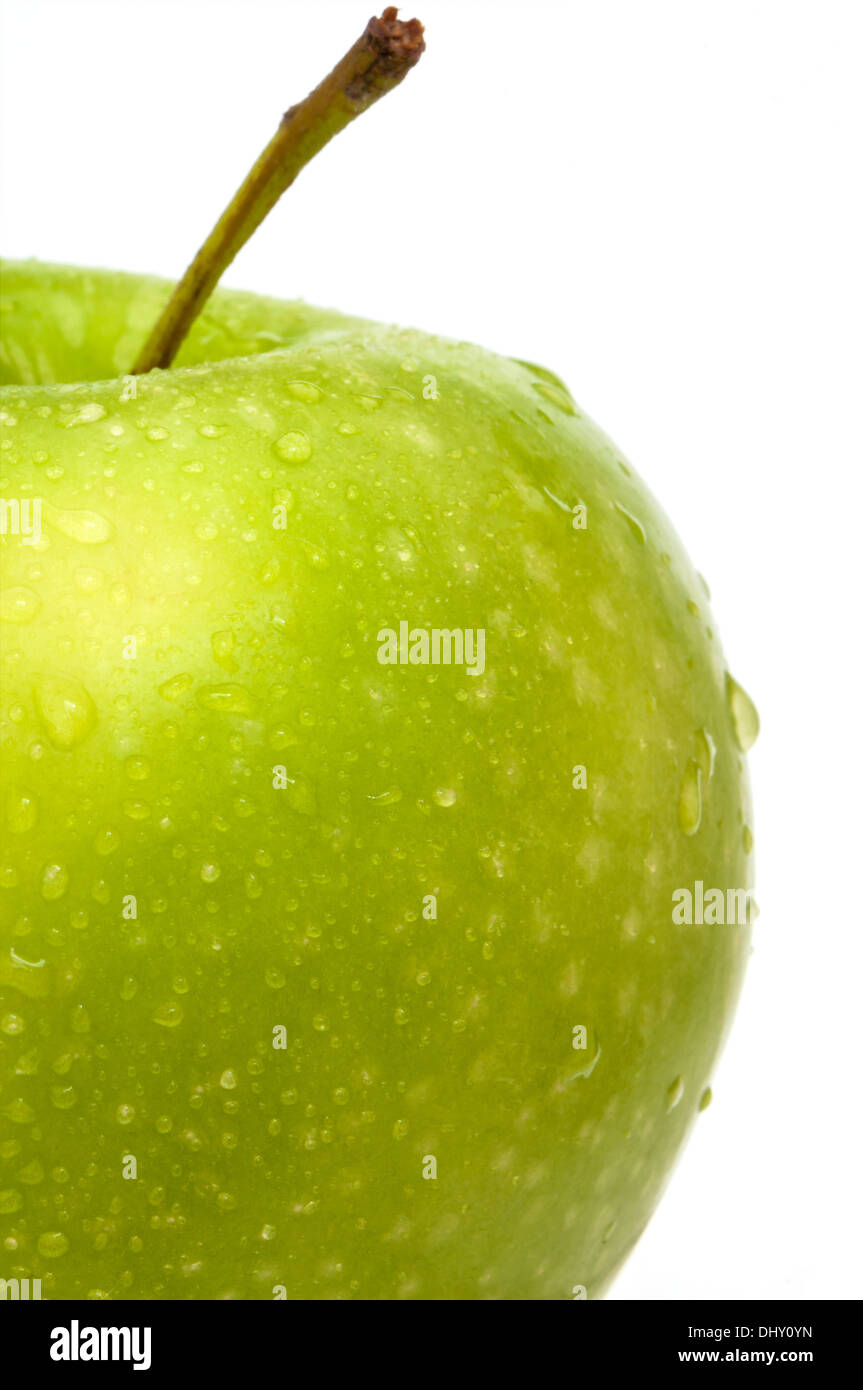 Green Apple wet on white background Stock Photo - Alamy