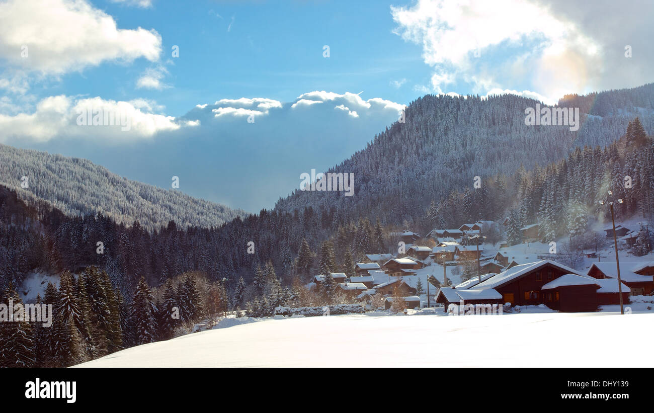 Snowy day in small French alpine village Stock Photo - Alamy