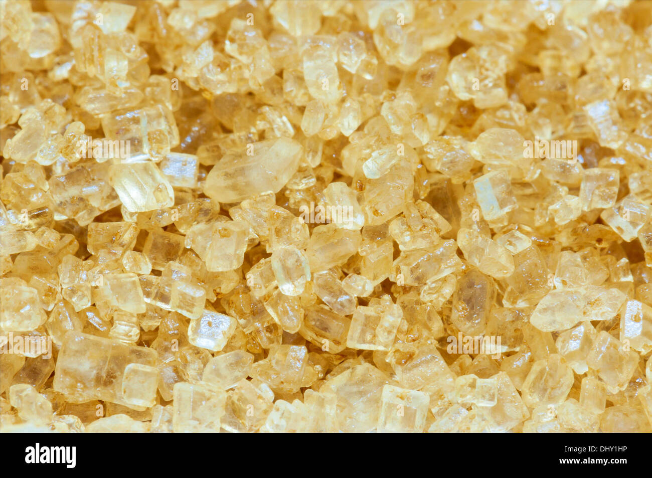 Cane sugar on white background Stock Photo - Alamy