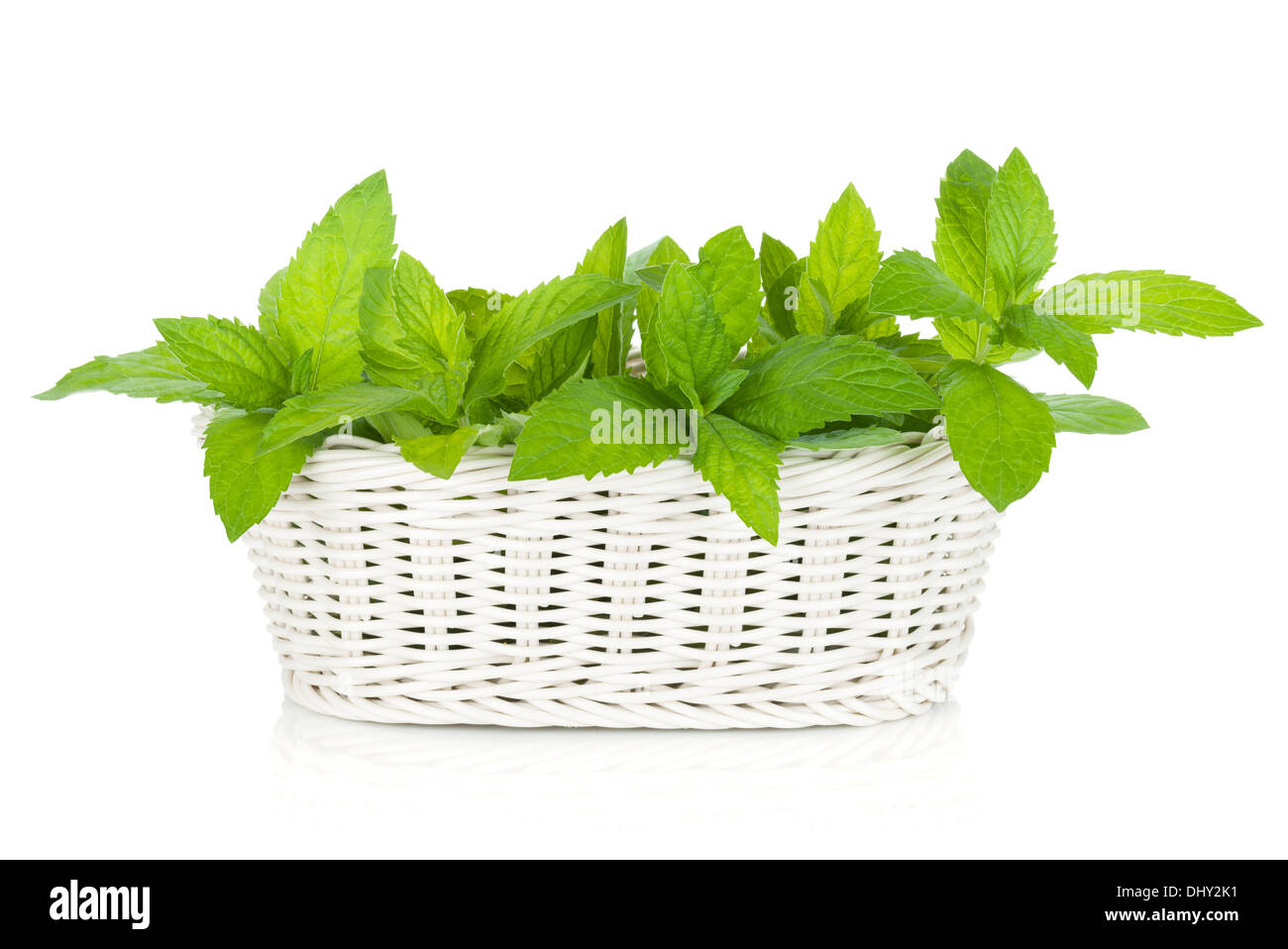 Basket of fresh mint. Isolated on white background Stock Photo - Alamy