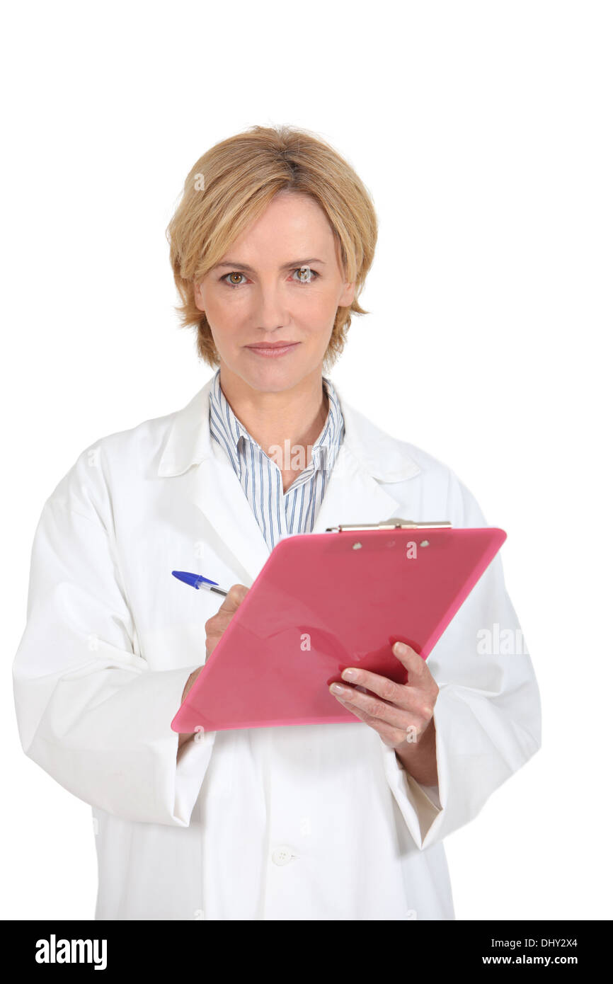 woman doctor taking notes Stock Photo - Alamy