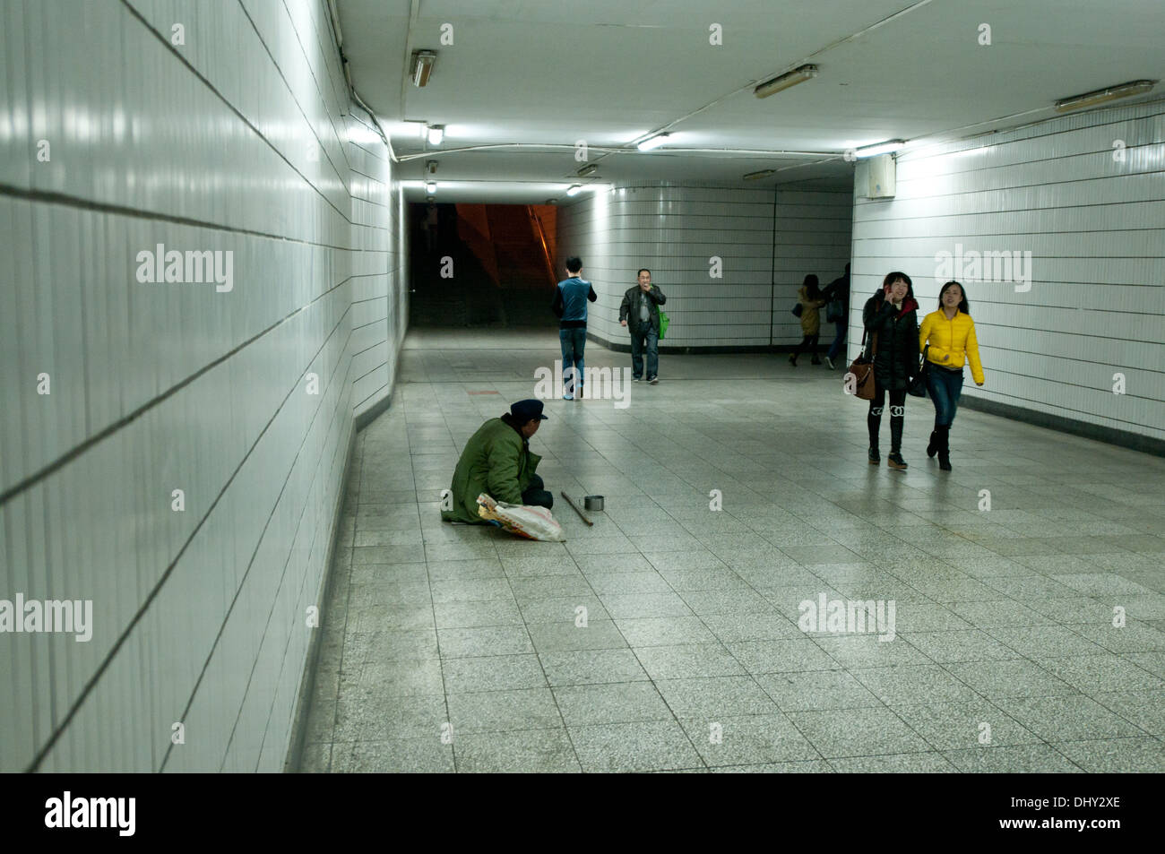 Beggar in underground passage in Beijing, China Stock Photo - Alamy