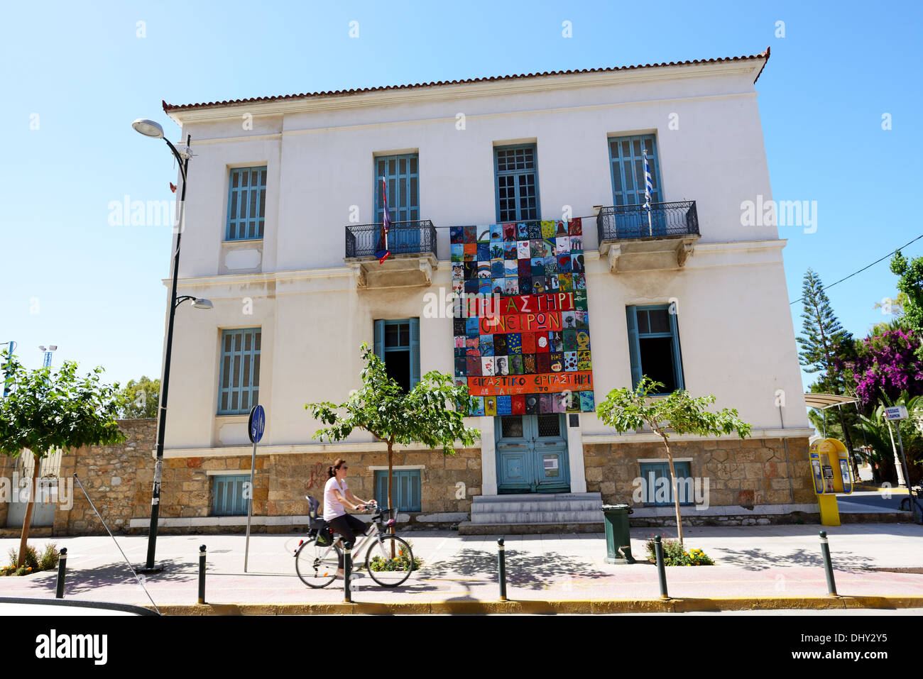 The building with paintings and cyclist Kalamata city, Messinia, Greece ...