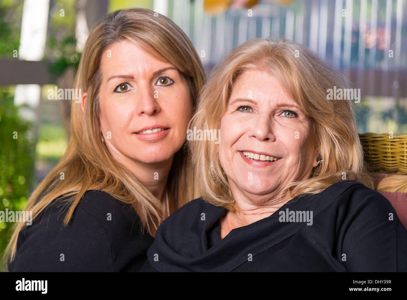 Portrait Of Two Women Mother And Daughter 61 And 44 Years Old