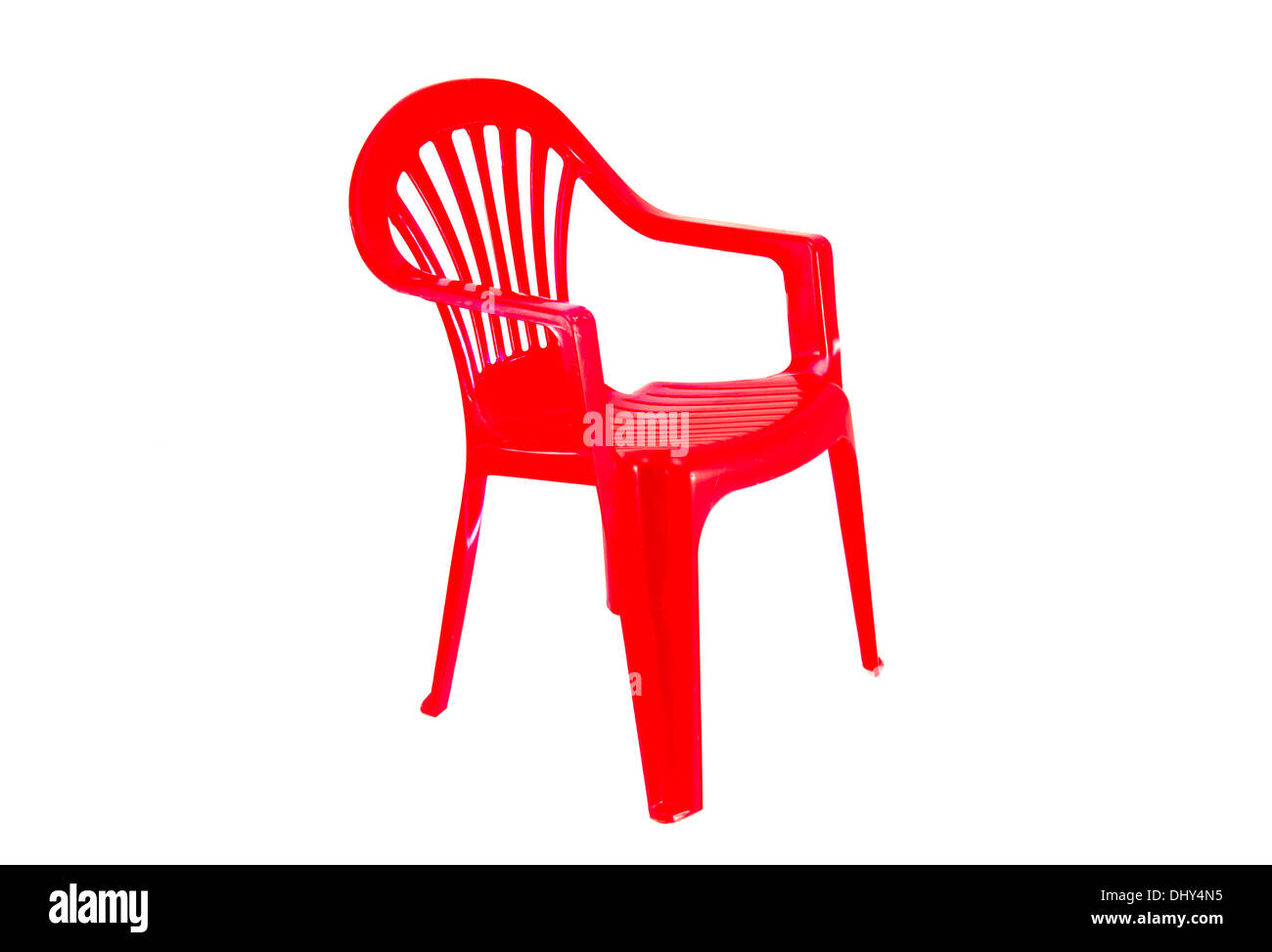 Red plastic chair isolated on a white background Stock Photo - Alamy