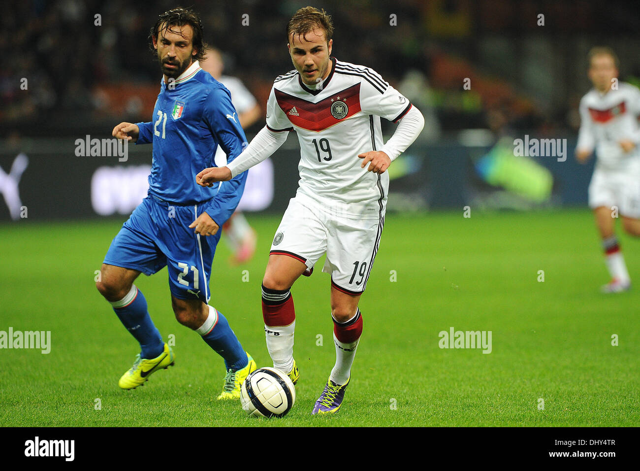Milan, Italy. 15th Nov, 2013. Germany's Mario Goetze and Italy's Andrea ...