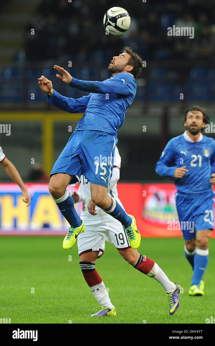 Milan, Italy. 15th Nov, 2013. Germany's Mario Goetze (BACK) and Italy's ...