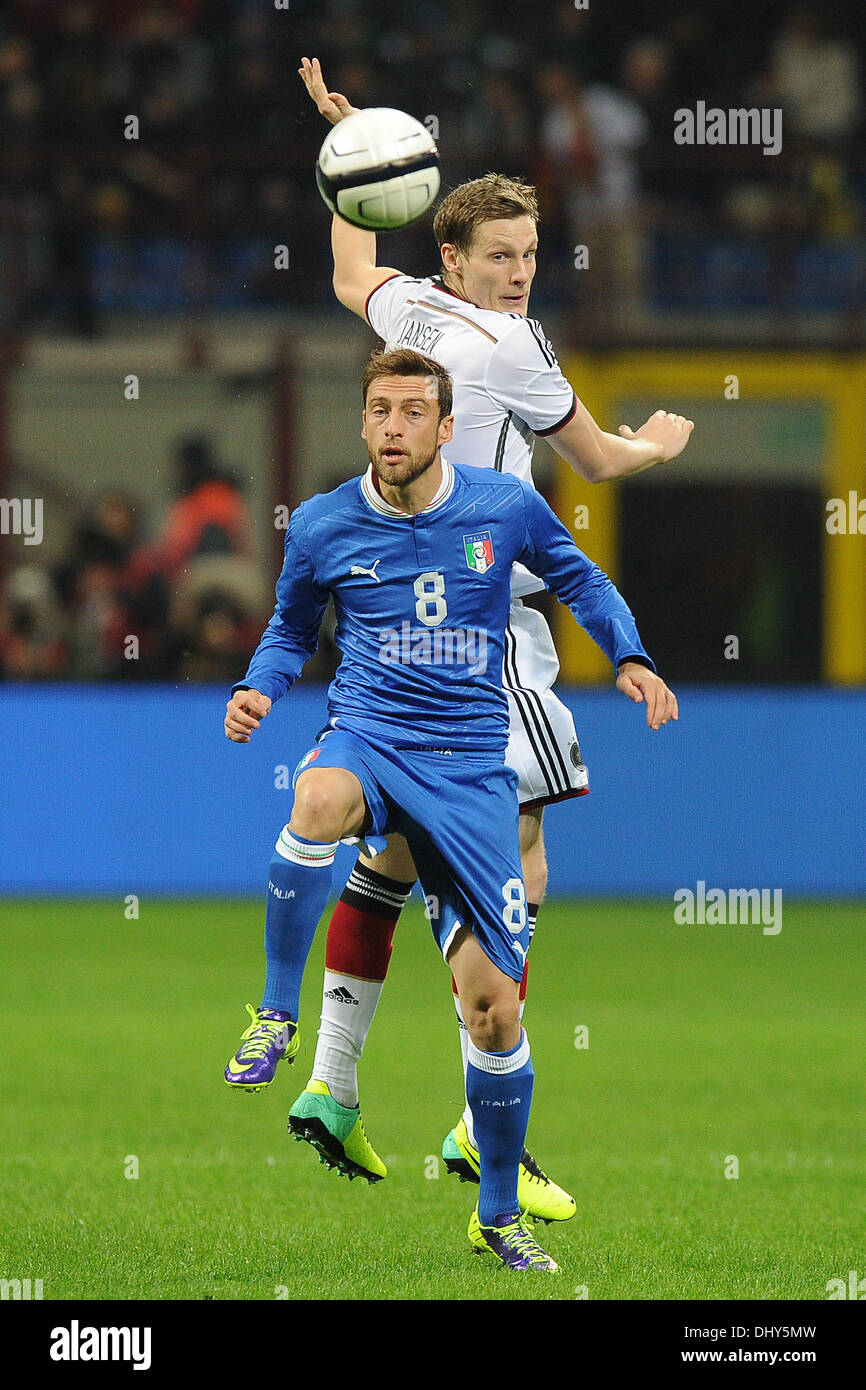 Milan, Italy. 15th Nov, 2013. Germany's Marcell Jansen (BACK) and Italy ...
