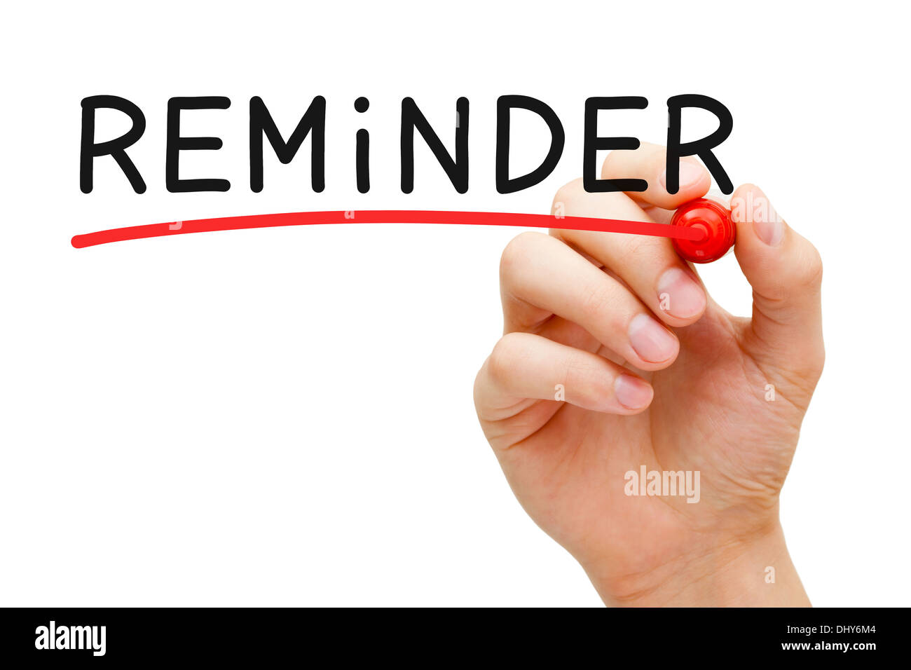 Hand underlining Reminder with red marker on transparent wipe board ...
