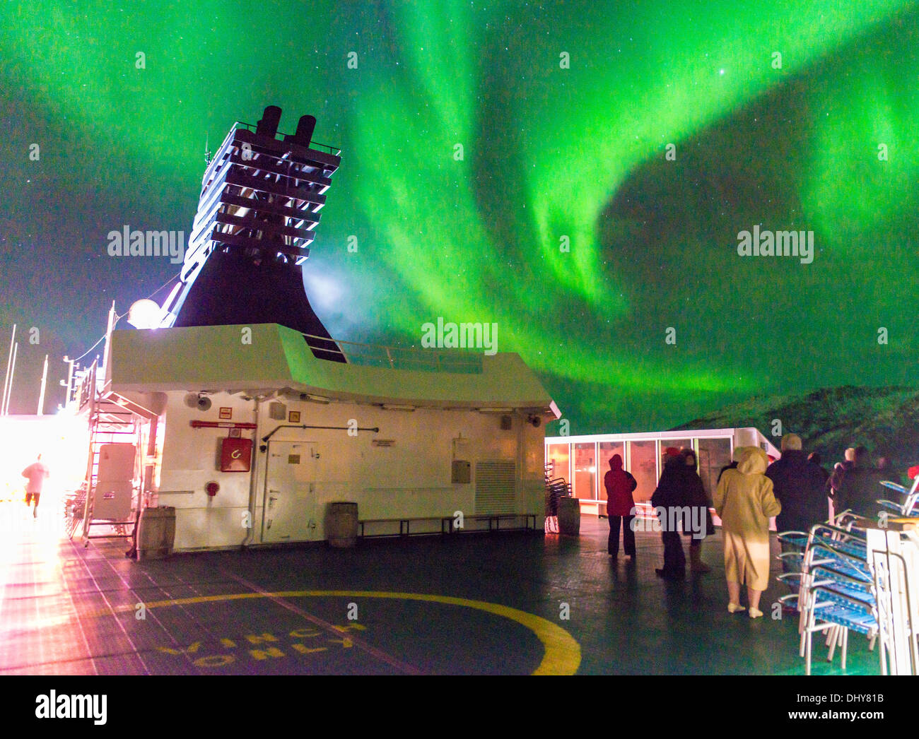 The Northern Lights swirl in the Norway sky over the Hurtigruten cruise ...