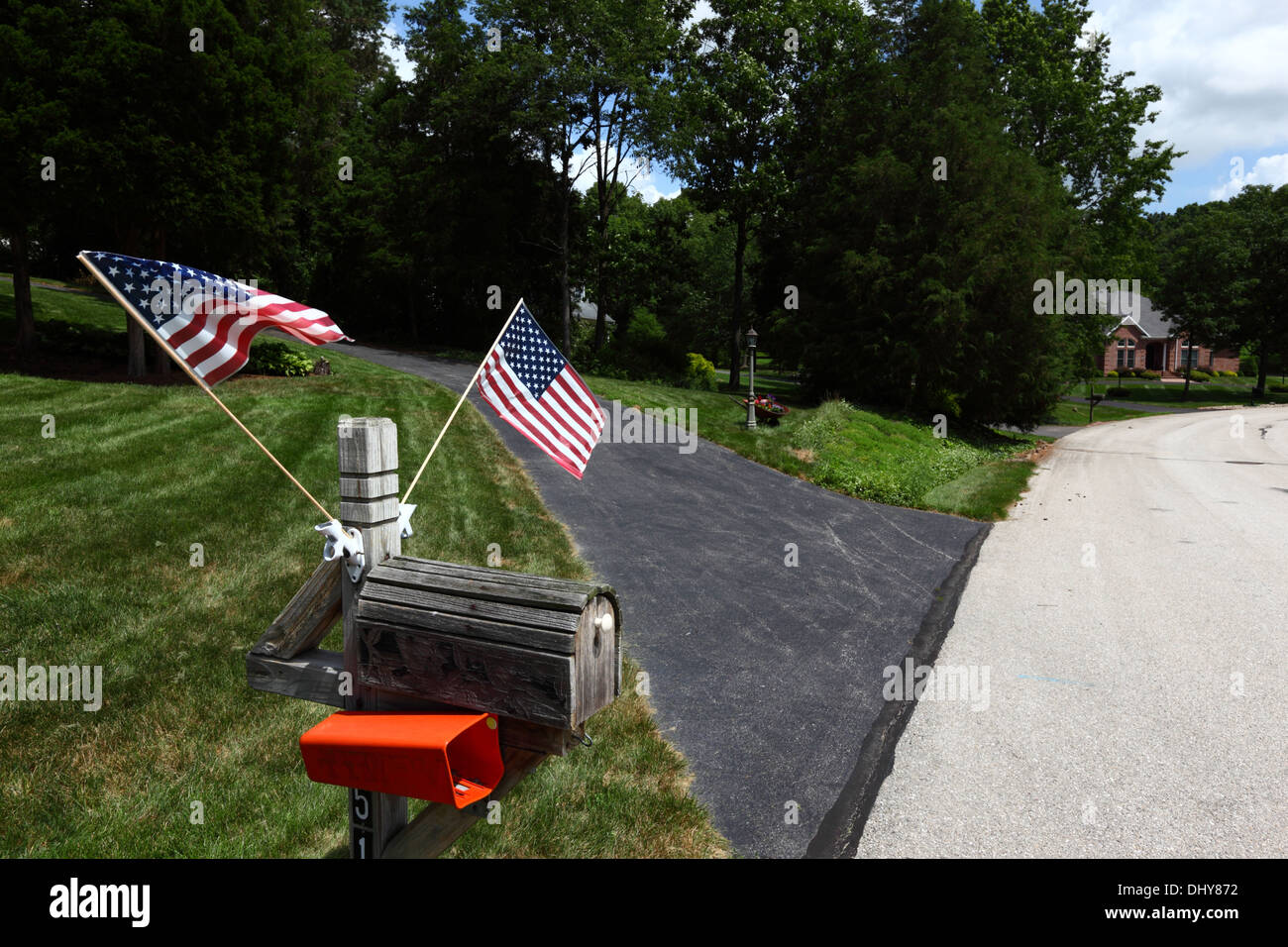 2 America flags on wooden letterbox in residential suburb, Gettysburg ...