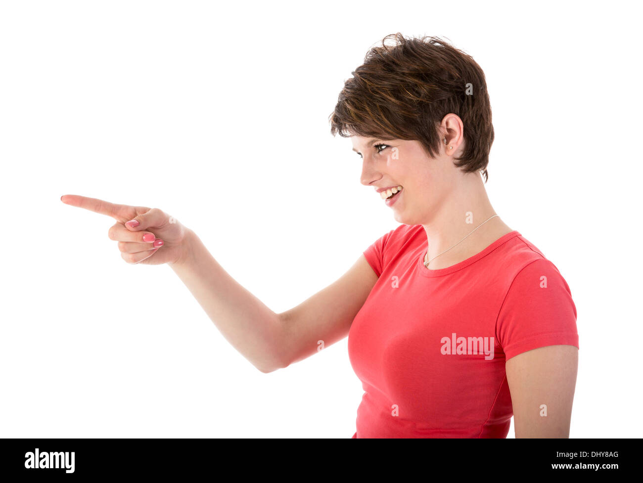 Pretty young woman pointing with her finger Stock Photo - Alamy