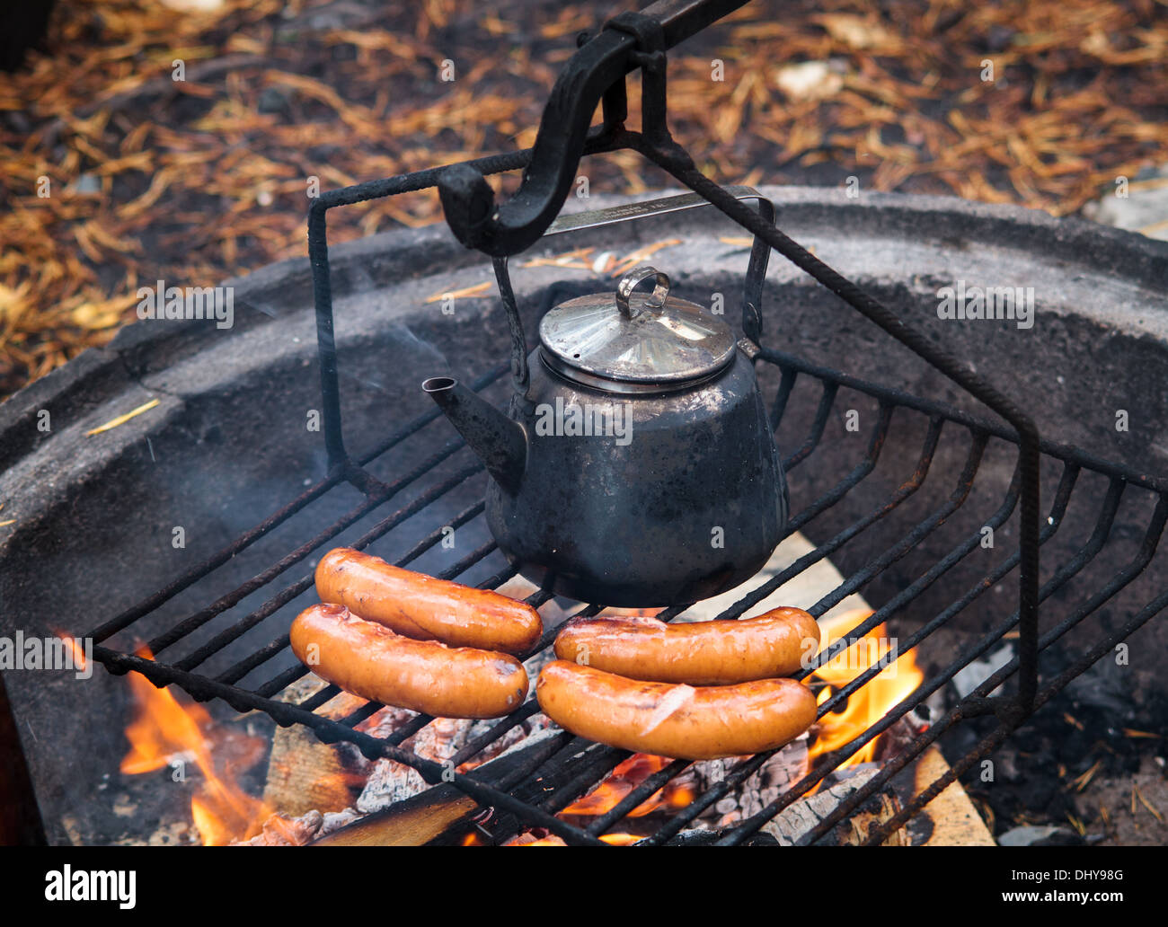 Old pot cooking over campfire hi-res stock photography and images - Alamy
