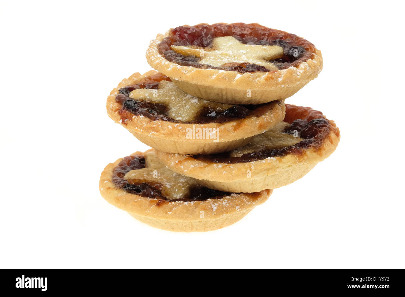 A stack of fresh mince pies with a pastry star middle - studio shot ...
