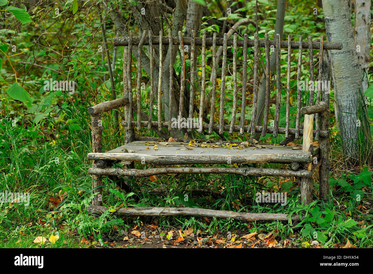 A seat made of sticks and tree branches Stock Photo - Alamy