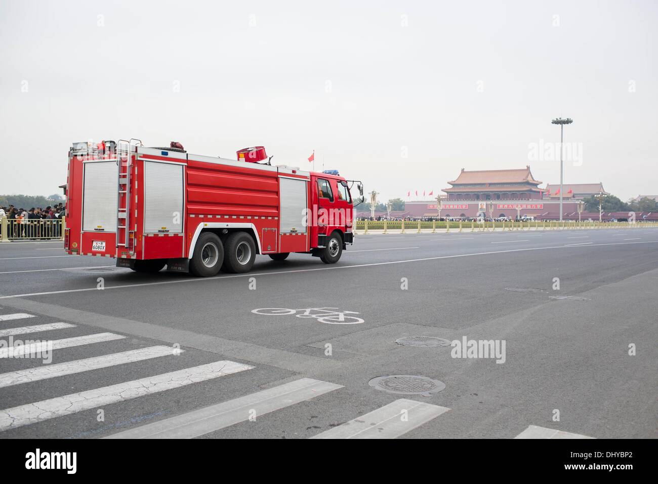 Beijing, China. 9th Nov, 2013. A red firetruck drives through the ...