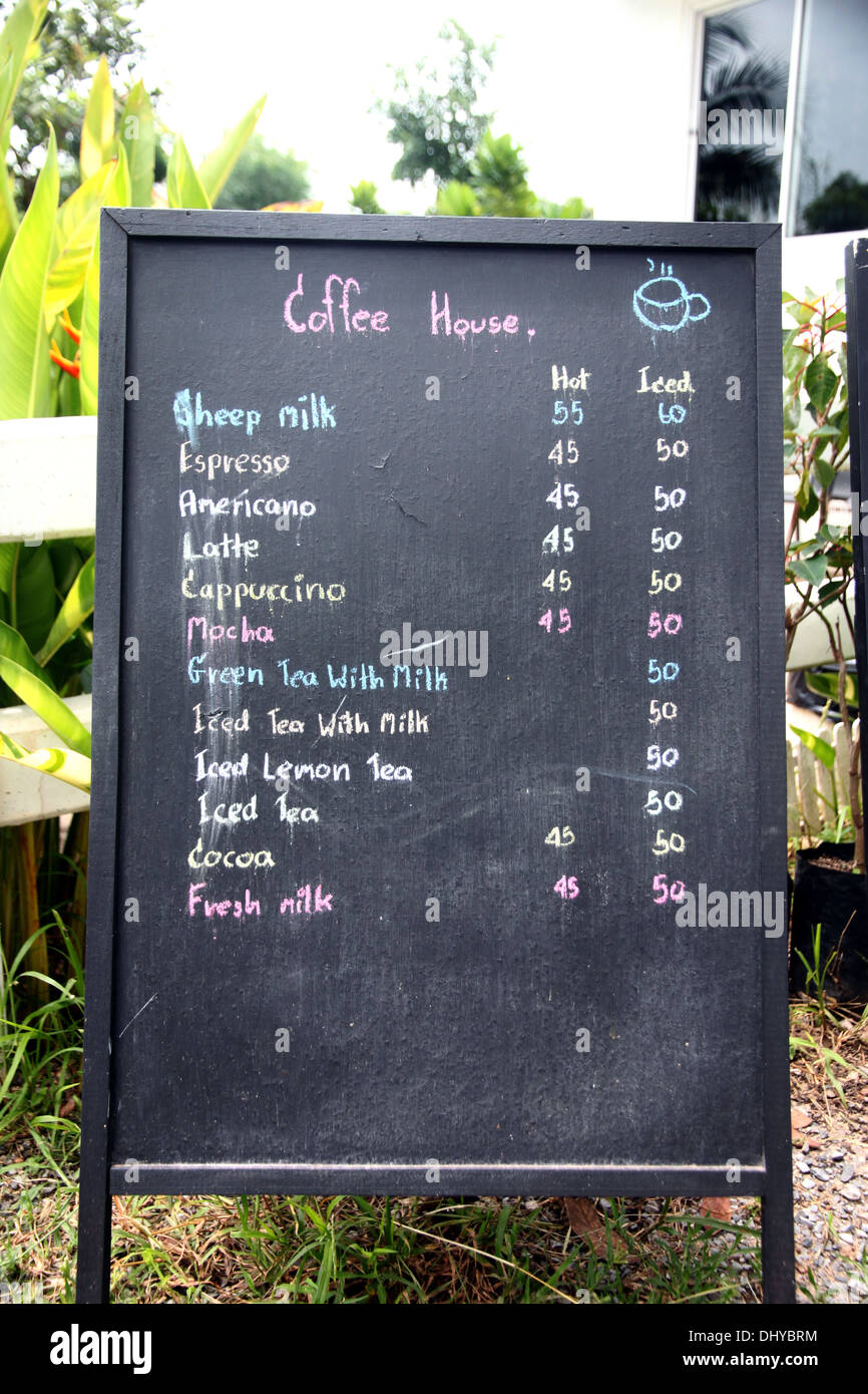 The picture Black wooden sign that indicates price of a coffee shop ...