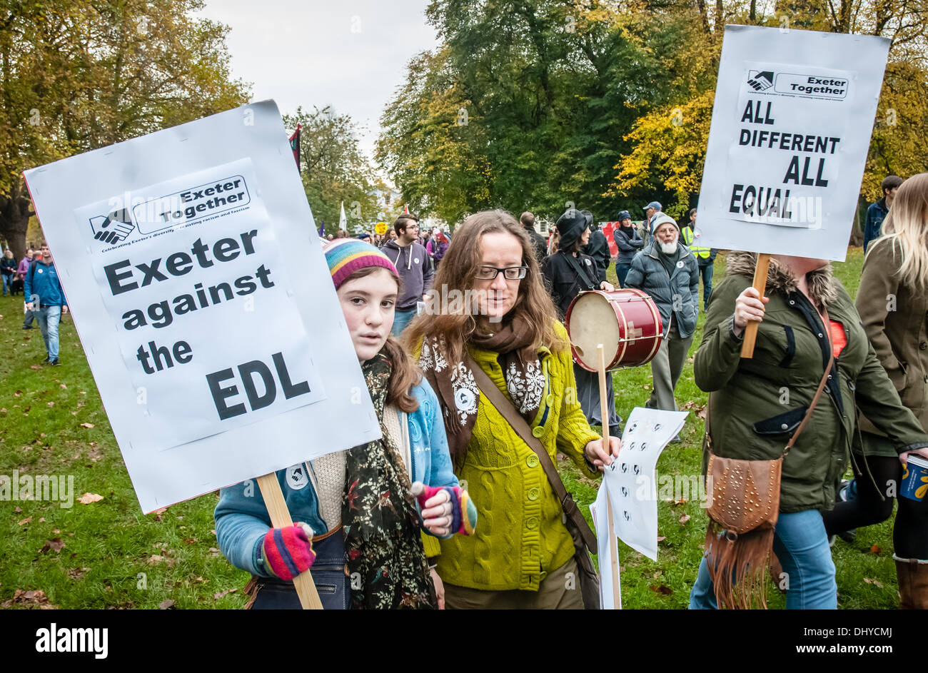 Mother and daughter hold up 'Exeter Against the EDL' placards during ...