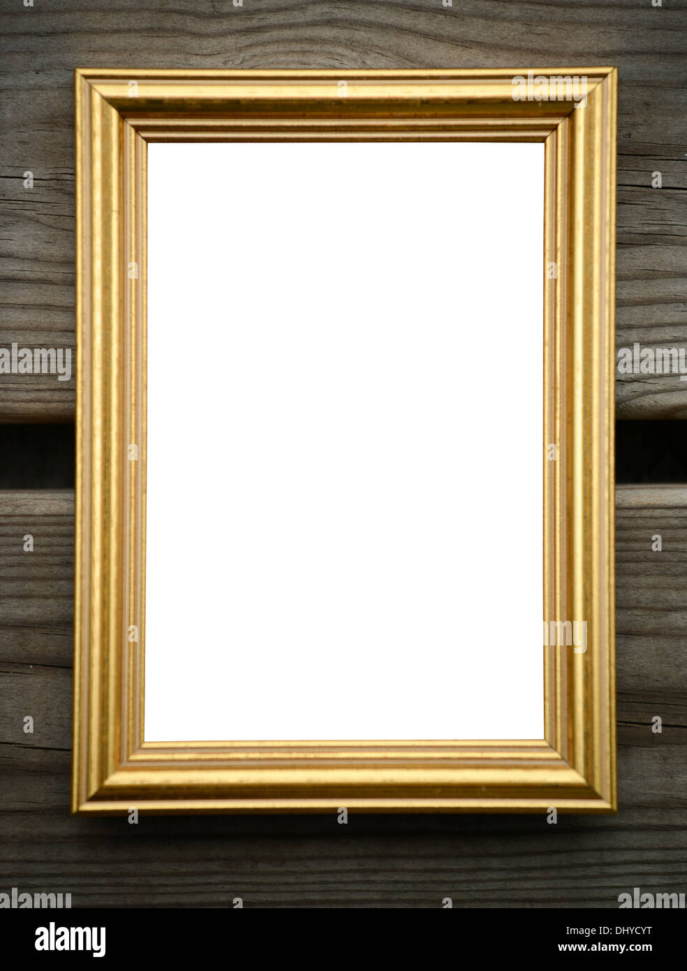 Empty golden picture frame on wooden wall Stock Photo - Alamy