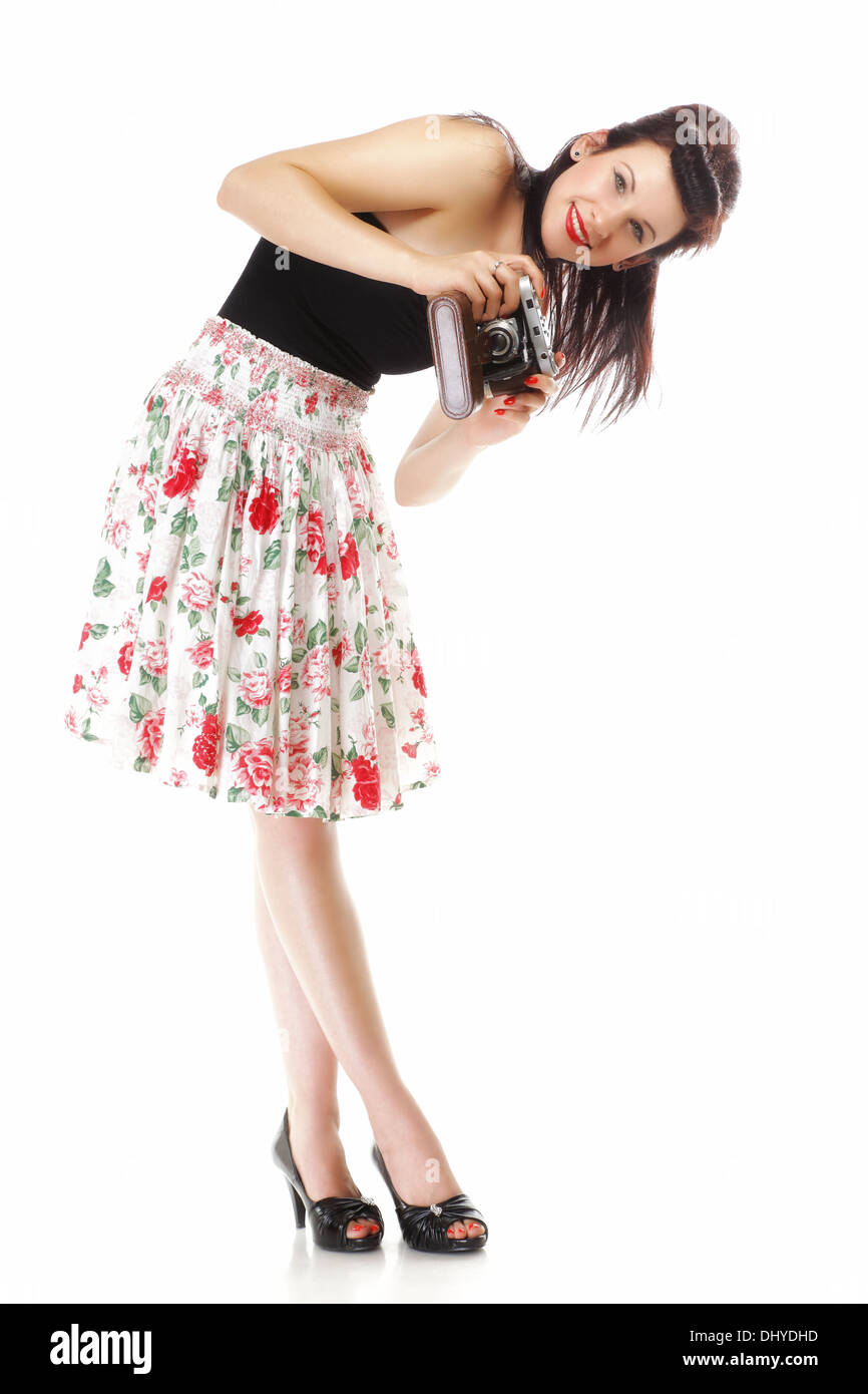 Full length pretty retro summer girl taking picture using vintage ...