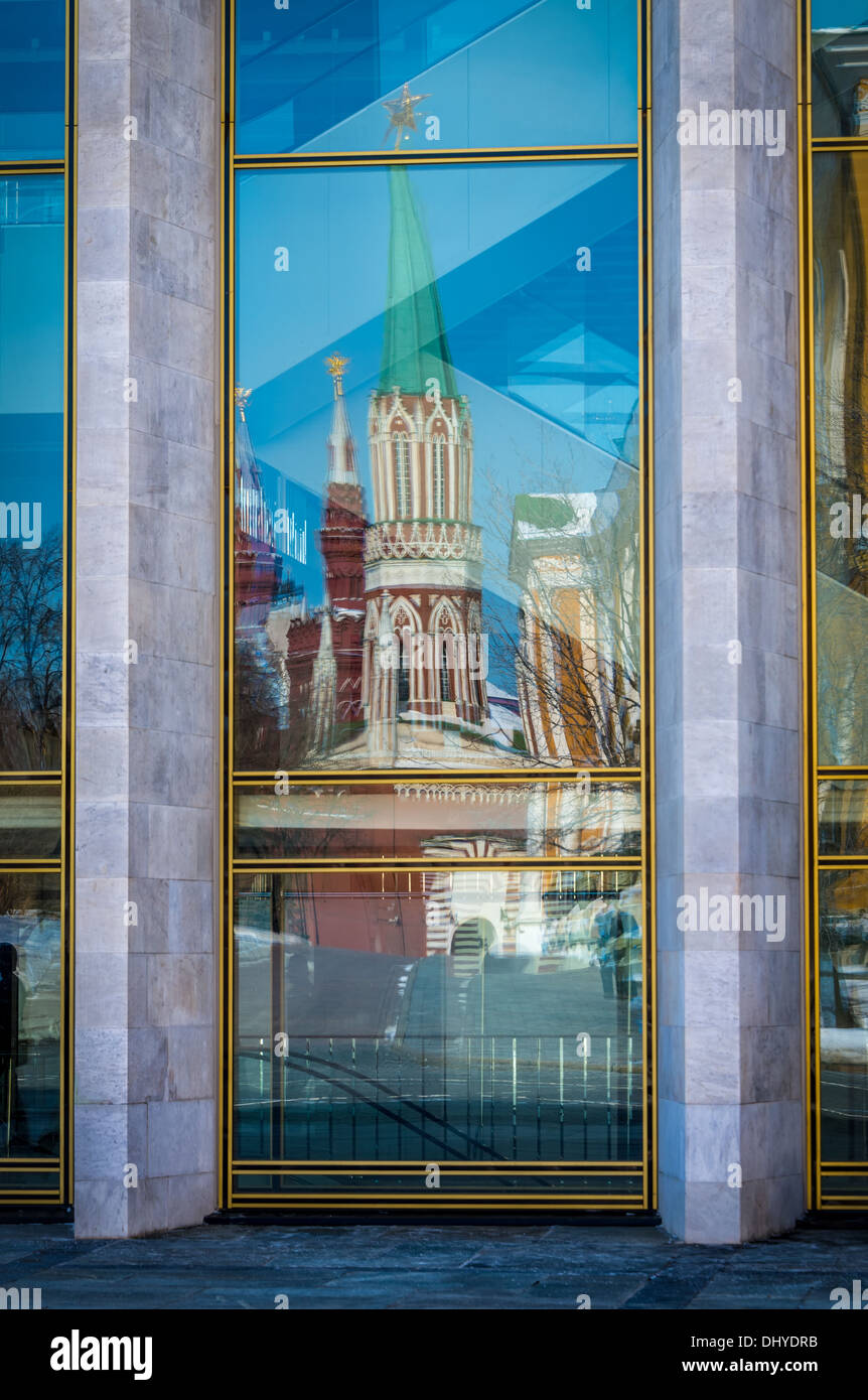 View of one of the traditional buildings being reflected in a modern ...