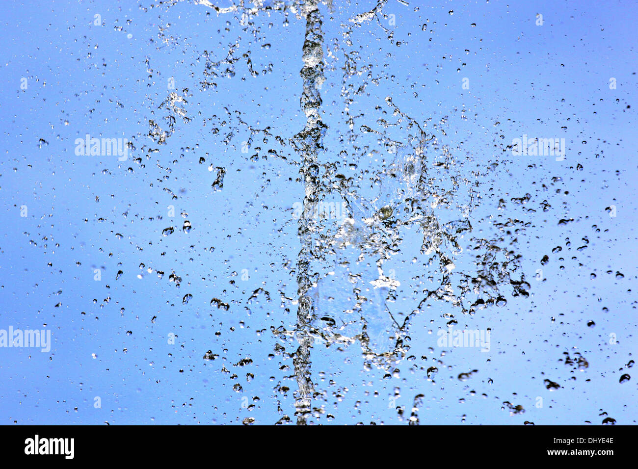 The water is wide spread on a blue background Stock Photo - Alamy