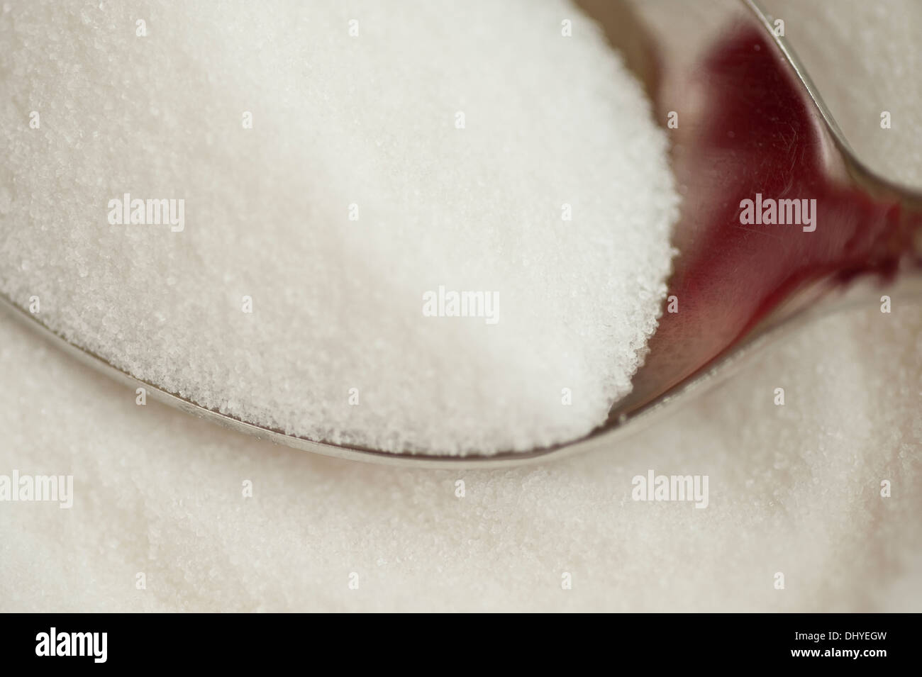 Spoon full of sugar Stock Photo - Alamy